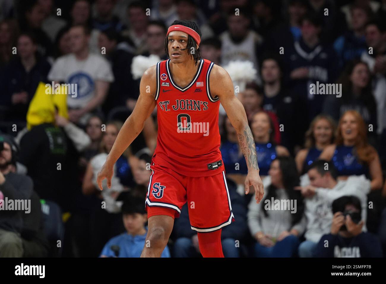 St. John's Aaron Scott plays during an NCAA college basketball game ...