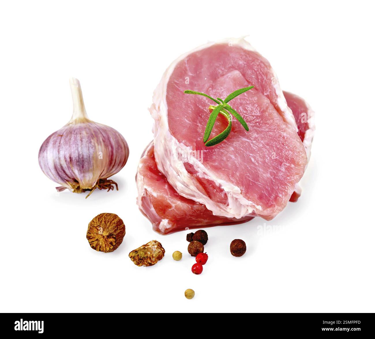 Two slices of pork, rosemary, peppercorns, garlic, nutmeg isolated on ...