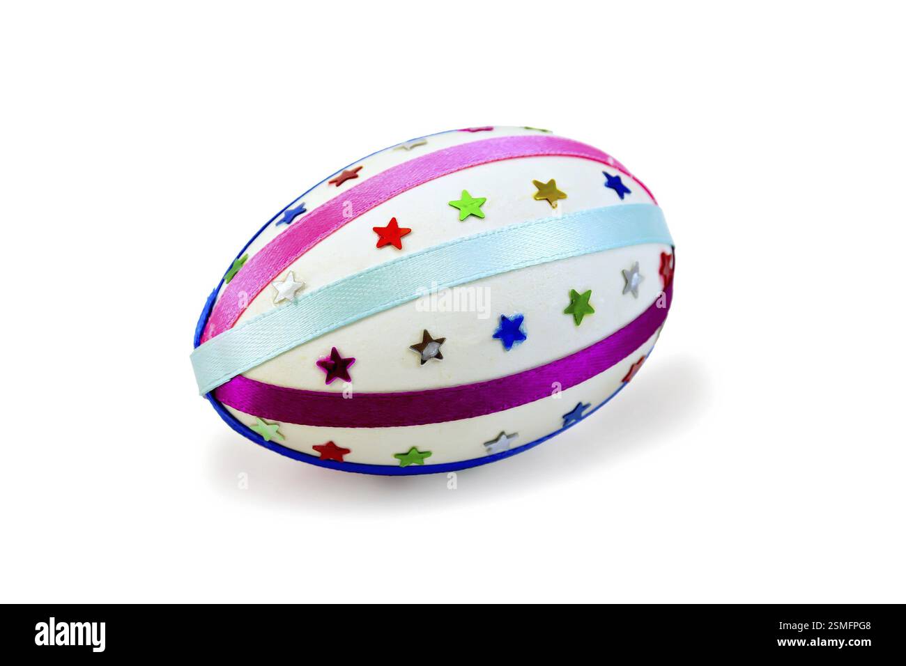 One easter egg, decorated with multicolored braid and sparkles in the ...