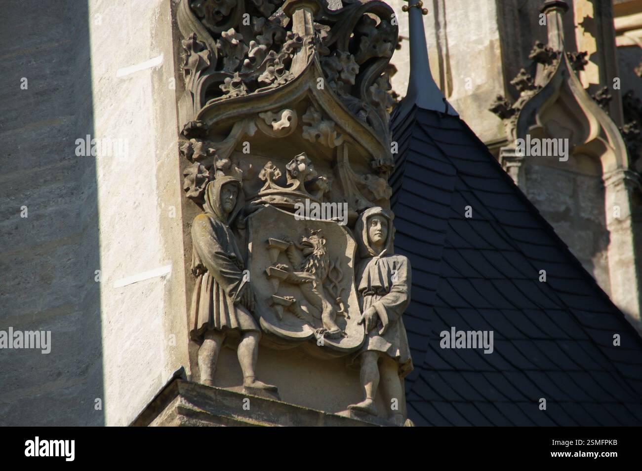 The Czech Republic. Ornate stone carving featuring a crowned shield ...