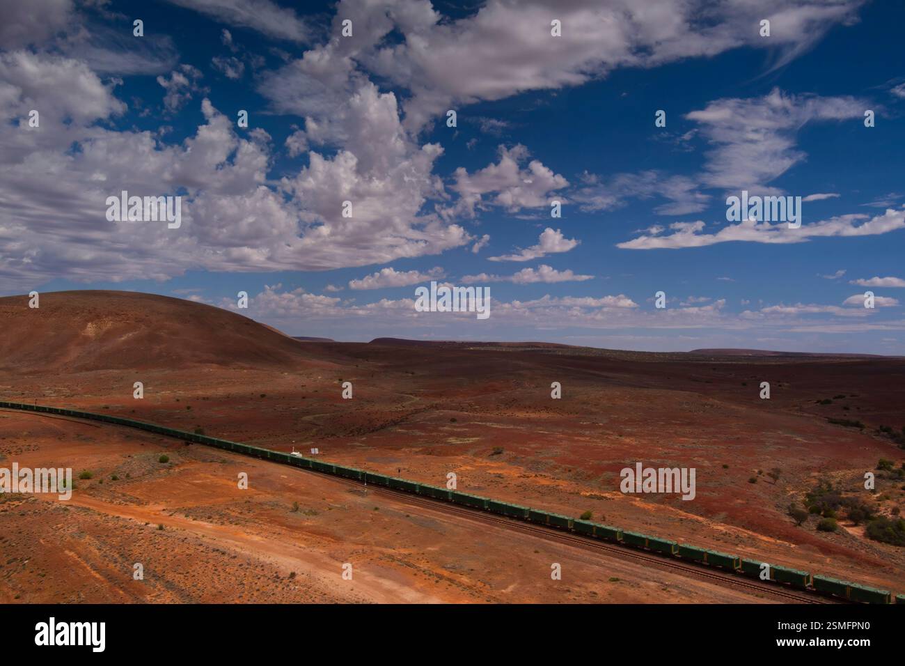 Mineral Sands dry bulk freight train on the Darwin Line passing through ...