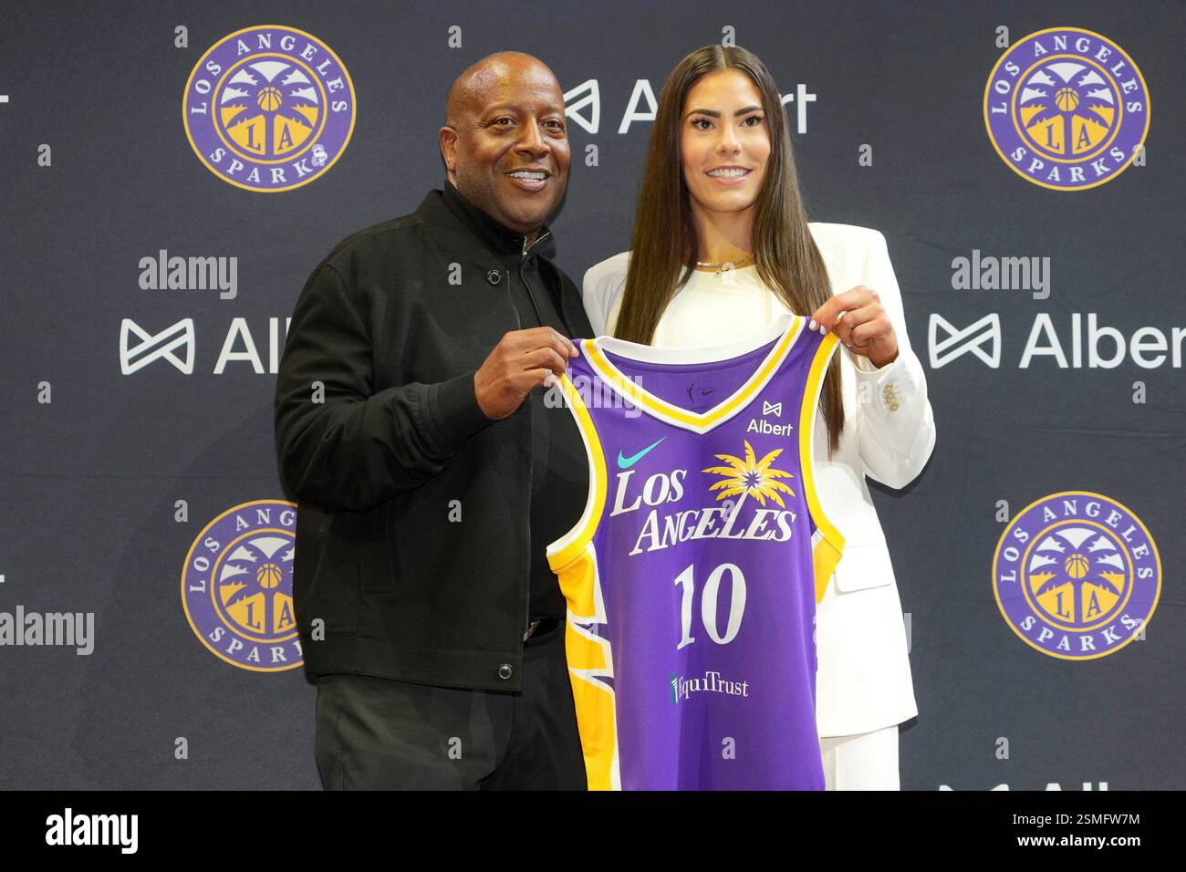 LA Sparks guard Kelsey Plum (right) poses with Sparks CEO and governor ...