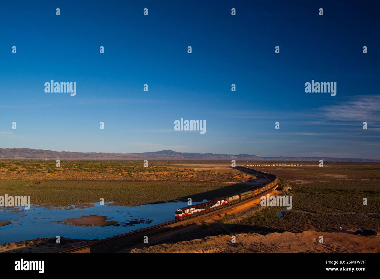 Aerial of SCT Double Stacked Intermodal container freight train passing ...