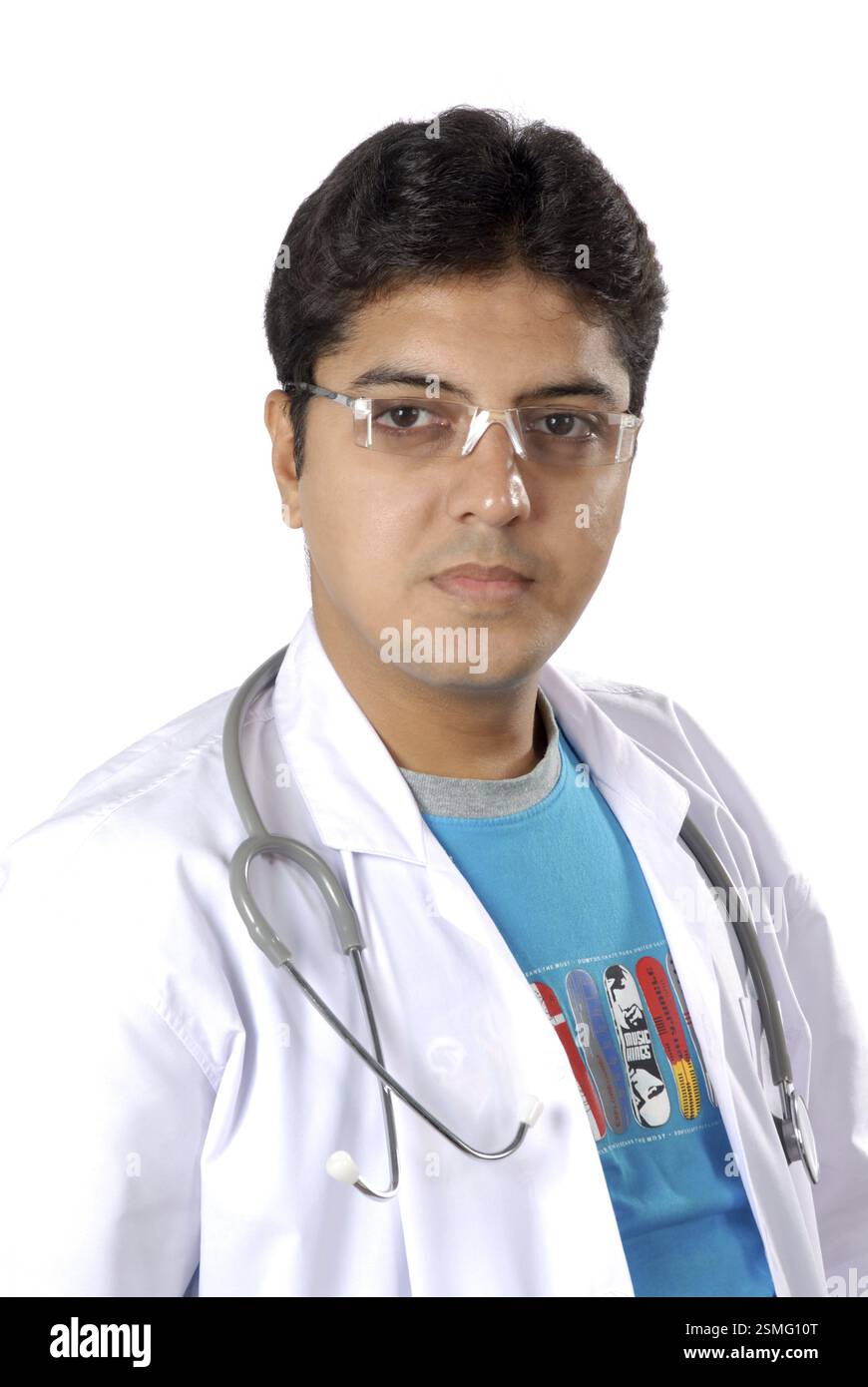 South Asian Indian doctor with stethoscope around neck looking at ...
