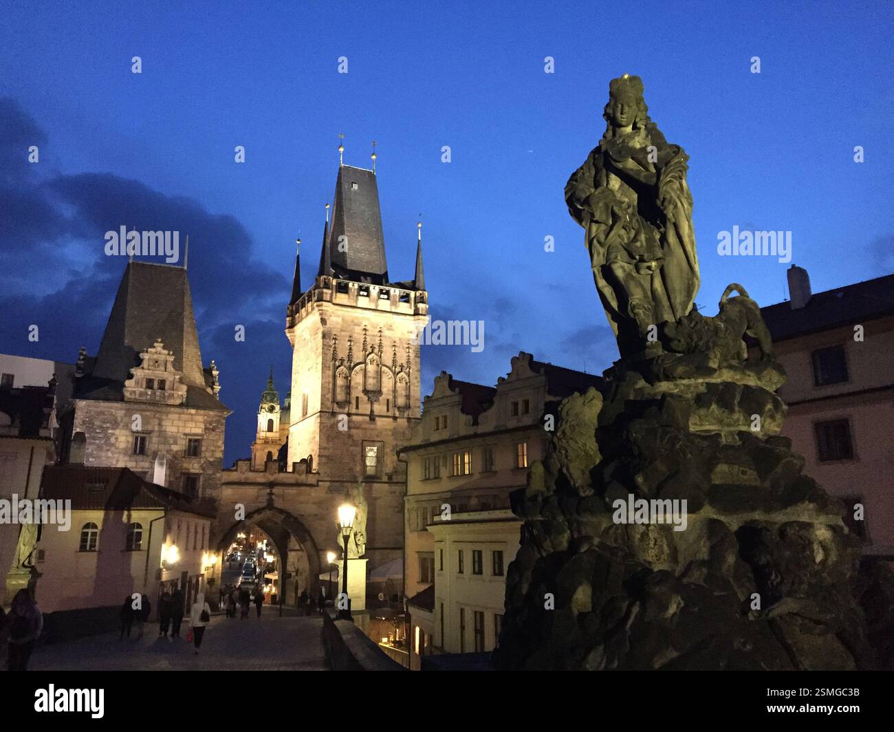 Charles Bridge, a symbol of Prague's enduring spirit, stands ...