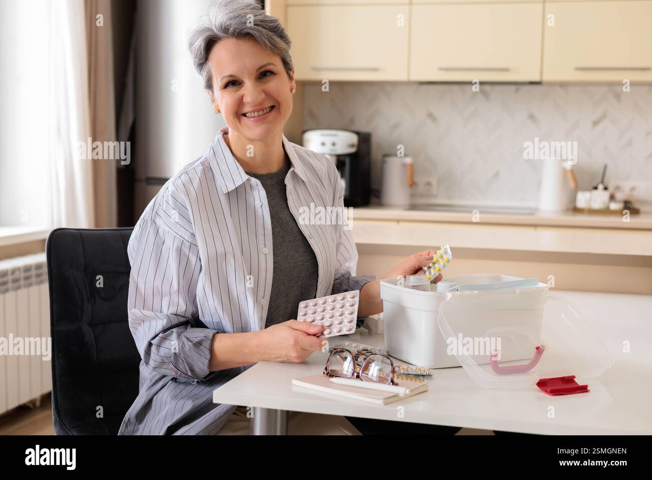 Beautiful, well-groomed and aged woman pensioner aged with gray ...
