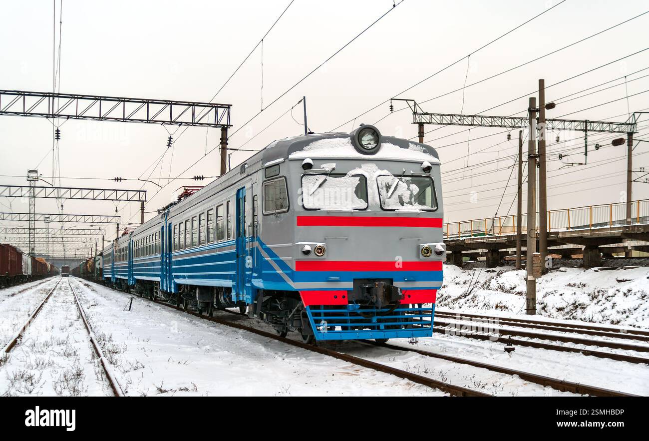 Typical soviet-built electric commuter train in winter in Kyiv, the ...