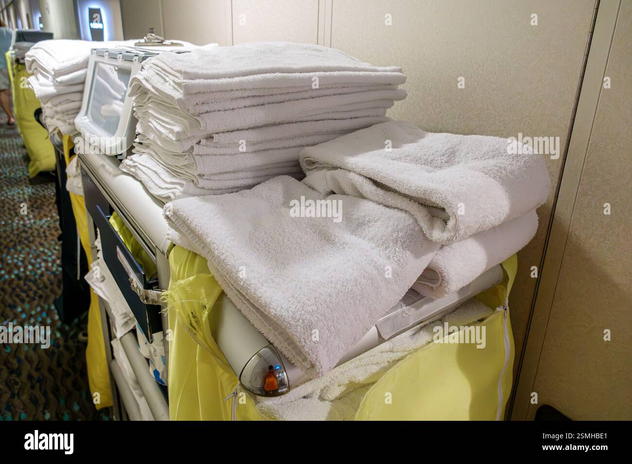 Clean towels stacked housekeeping cart service corridor detail hi-res ...