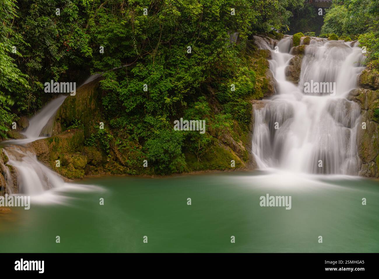 Water flowing through the rocks of the river in The Xiaoqikong Scenic ...