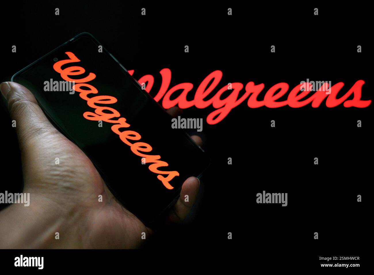 In this photo illustration, a Walgreens logo is seen displayed on a ...