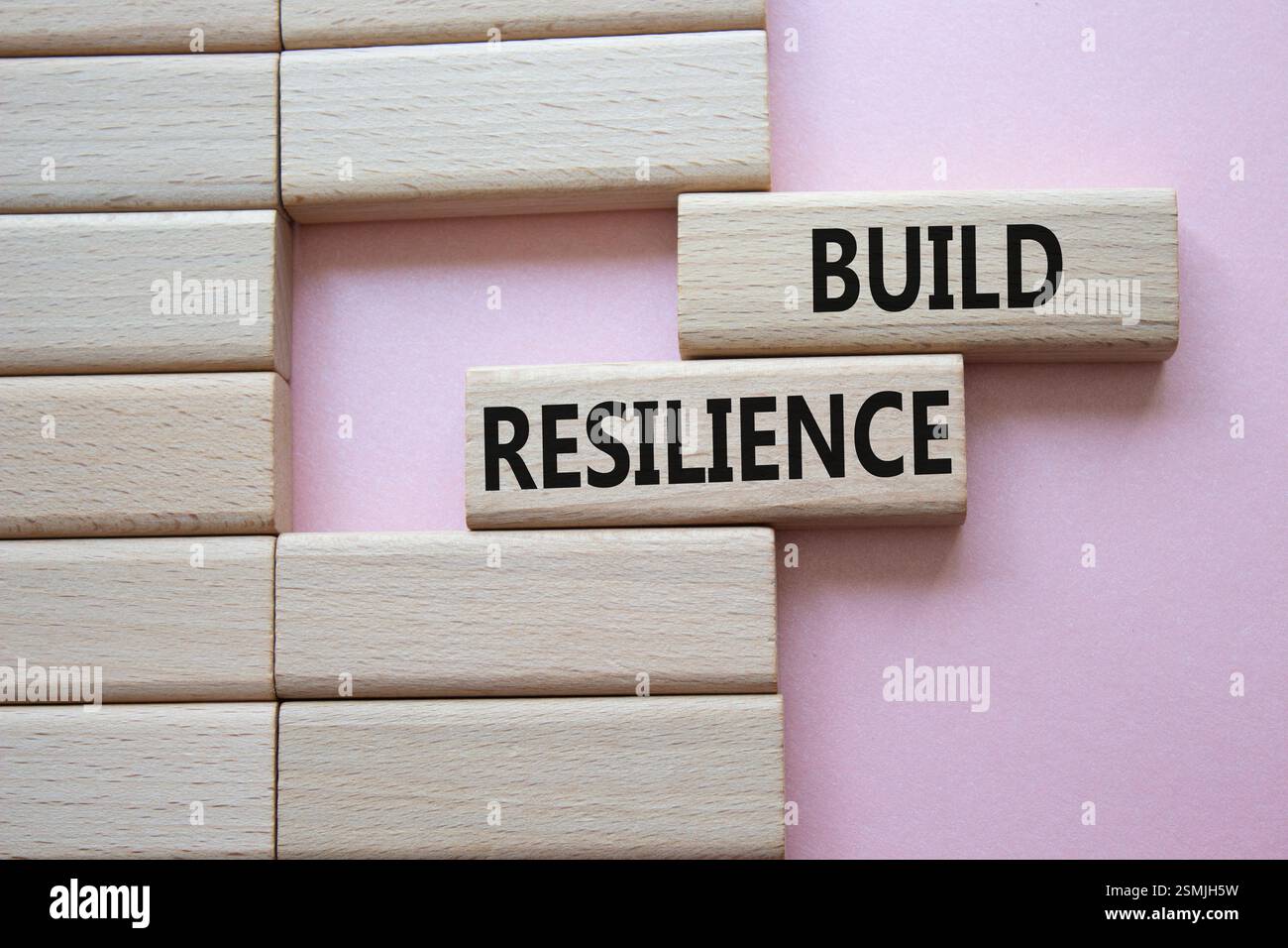 Build resilience symbol. Wooden blocks with words Build resilience ...