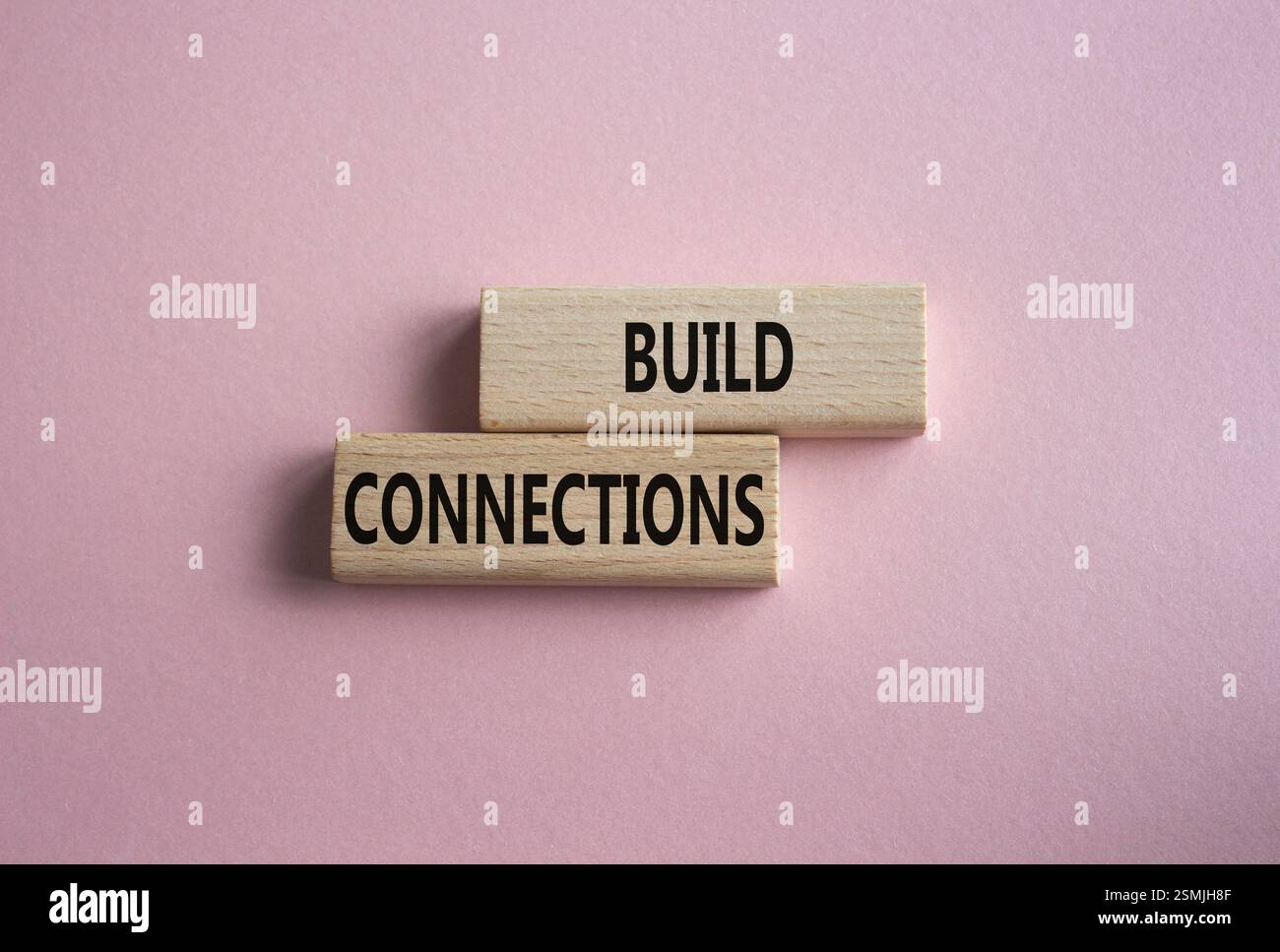 Build Connections symbol. Concept word Build Connections on wooden ...