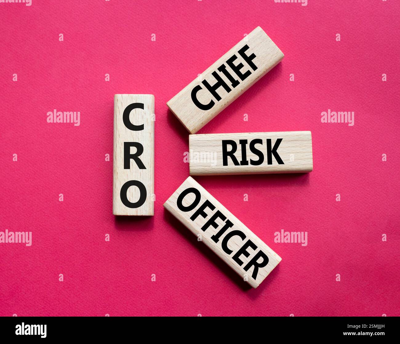 CRO - Chief Risk Officer symbol. Concept word CRO on wooden cubes ...