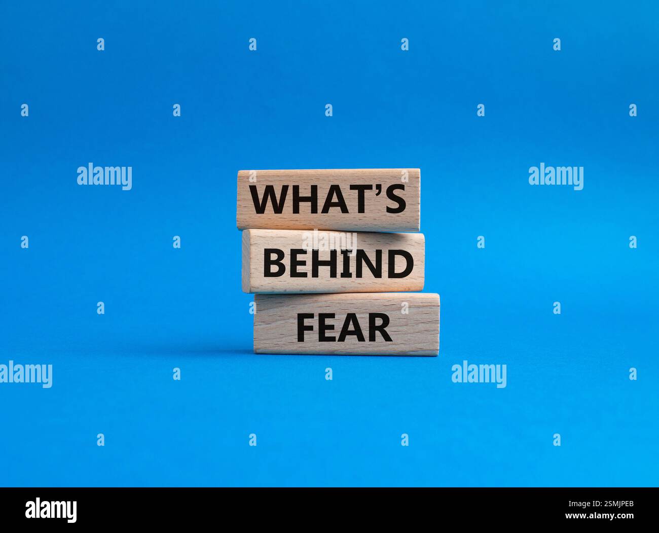 What's behind fear symbol. Concept words What's behind fear on wooden ...