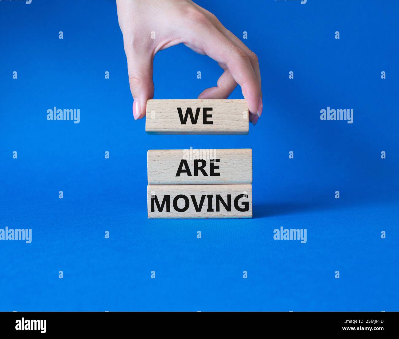 We are moving symbol. Concept word We are moving on wooden blocks ...
