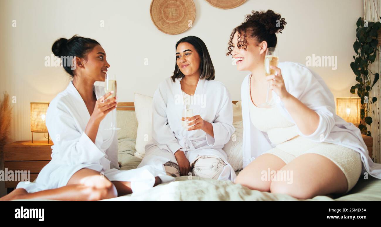 Bridesmaids, happy friends and women with champagne in bedroom for ...