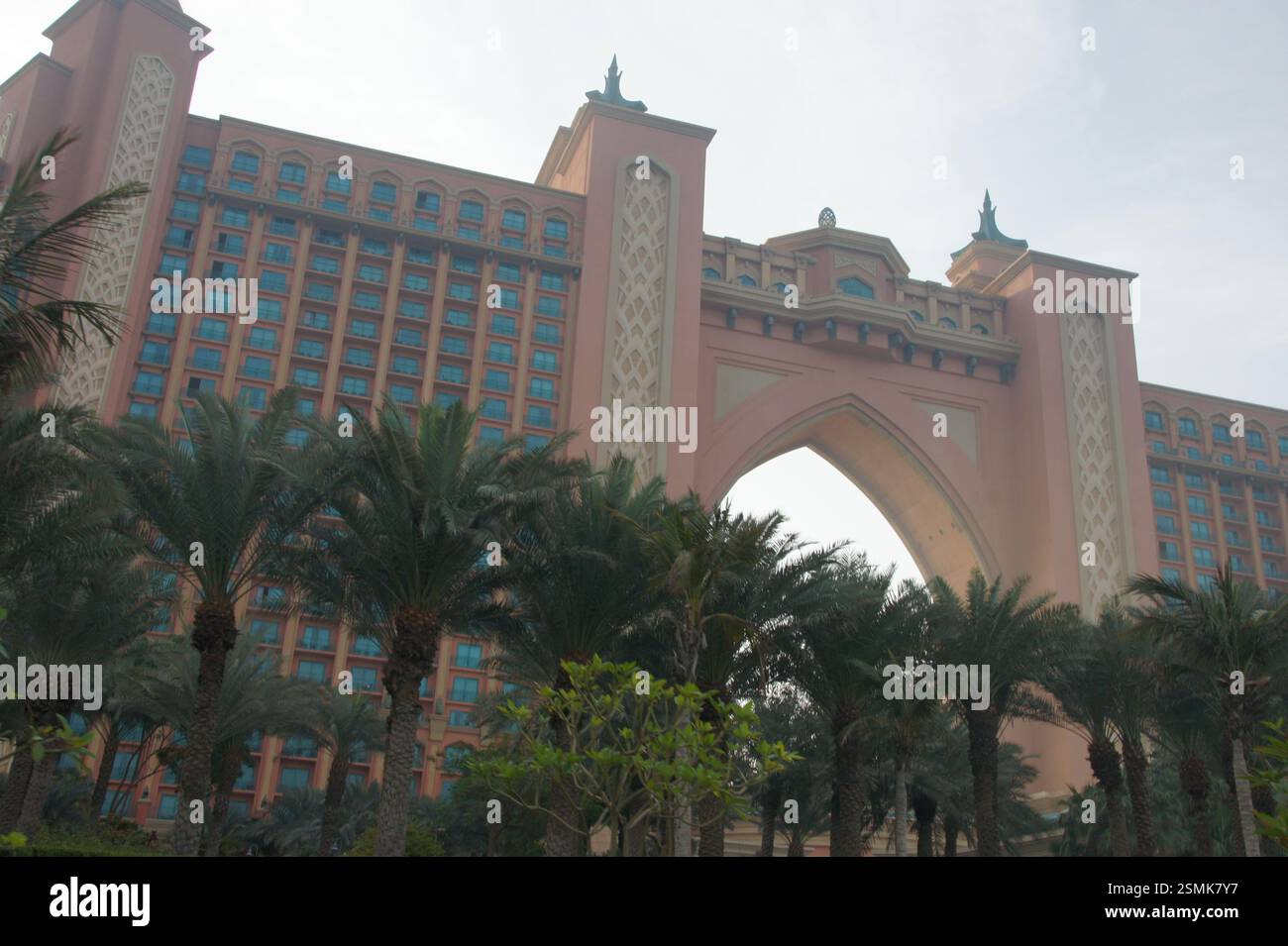 Sparkling pink Atlantis The Palm, a luxurious Dubai hotel, graces a man ...
