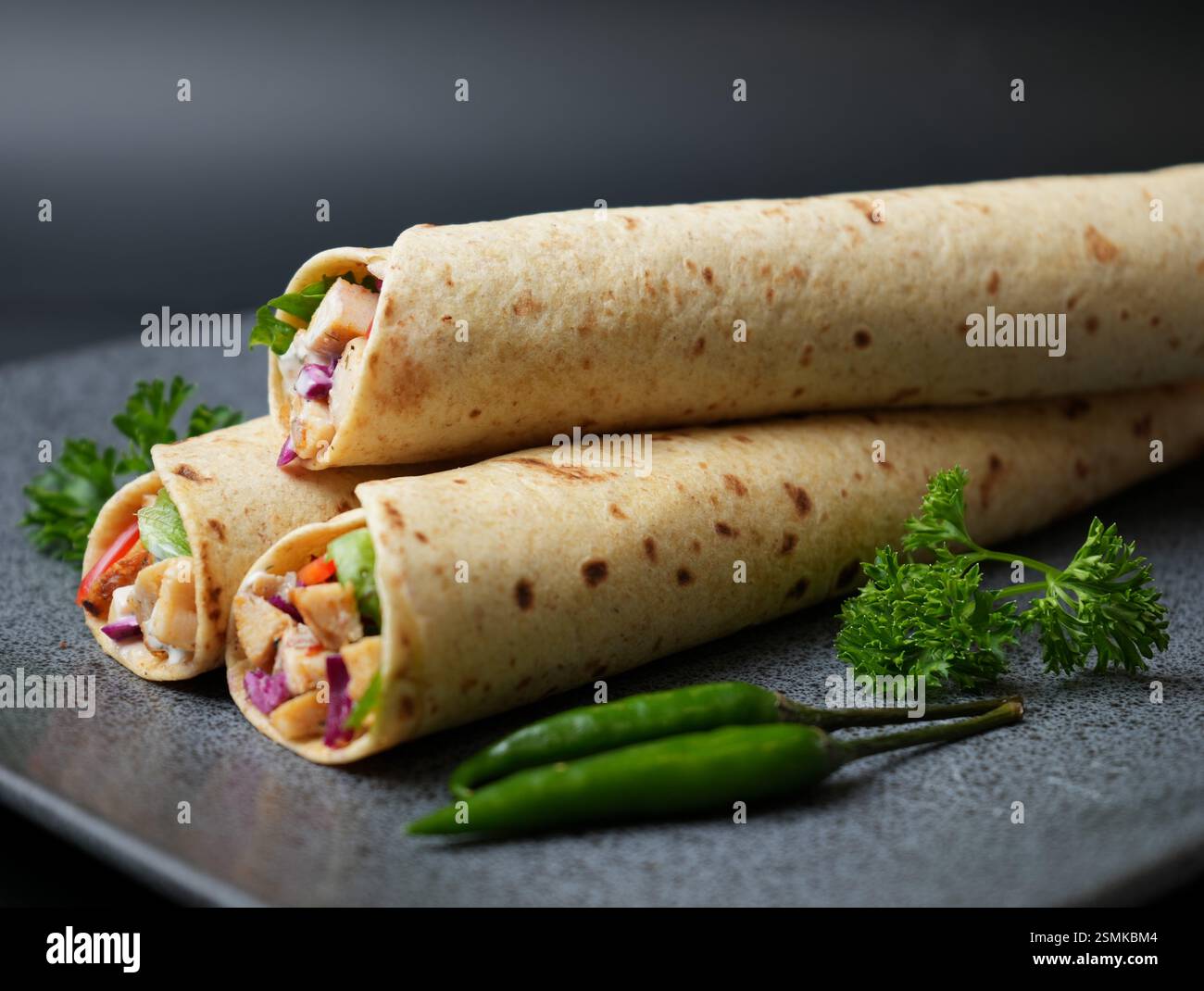 Delicious Chicken Wraps Shawarma with Fresh Vegetables Stock Photo - Alamy