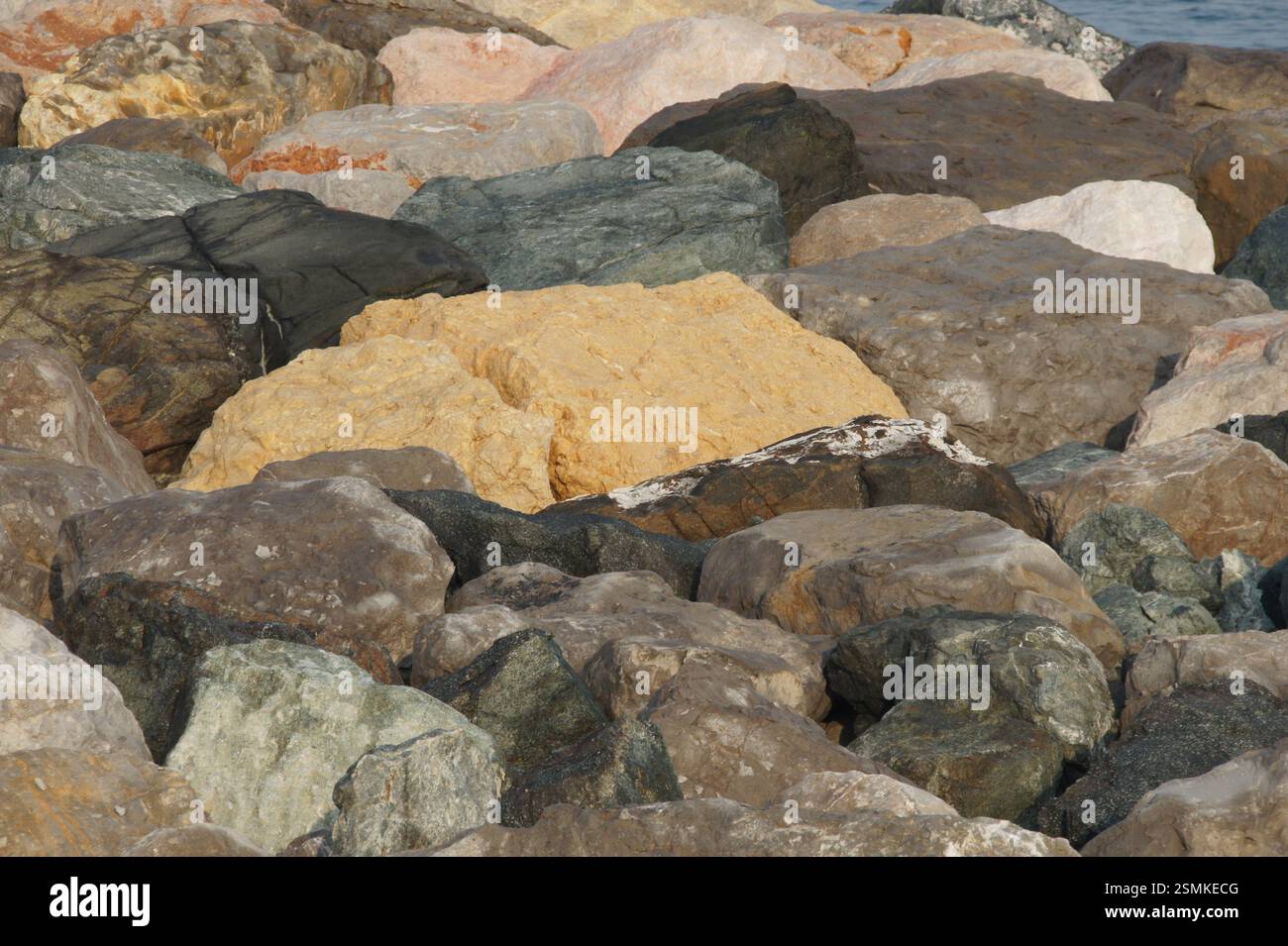 Dubai's beach boasts piles of smooth, colorful rocks, worn by waves ...