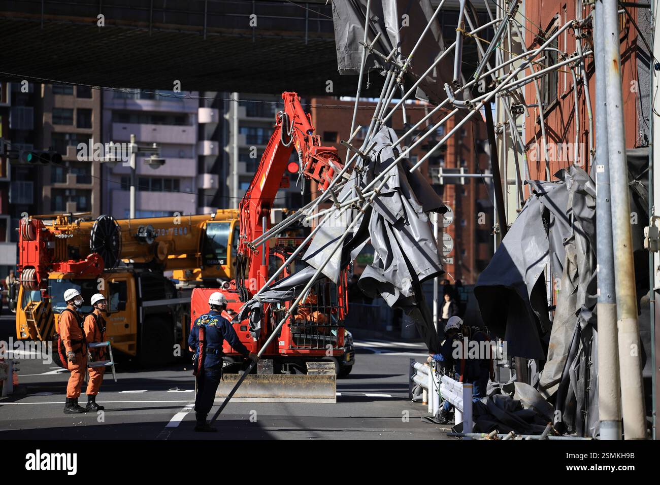 Scaffolding at a construction site is collapsed due to strong wind in ...