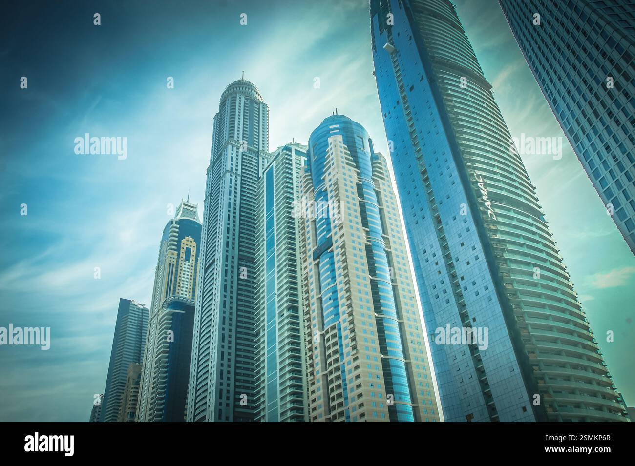 Skyscrapers pierce a clear blue sky in Dubai, a dazzling metropolis ...