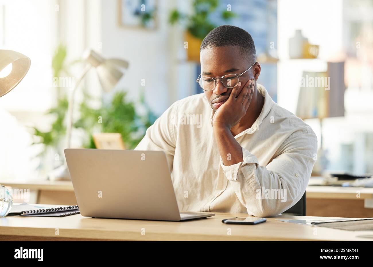 Tired, business and black man with laptop, stress and overworked with ...