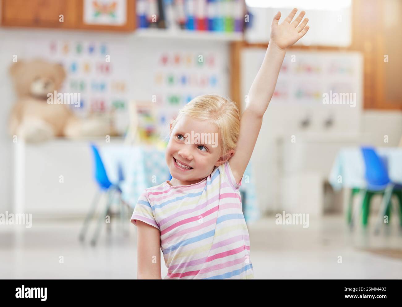 Student, child and question with hands raised in classroom for lesson ...