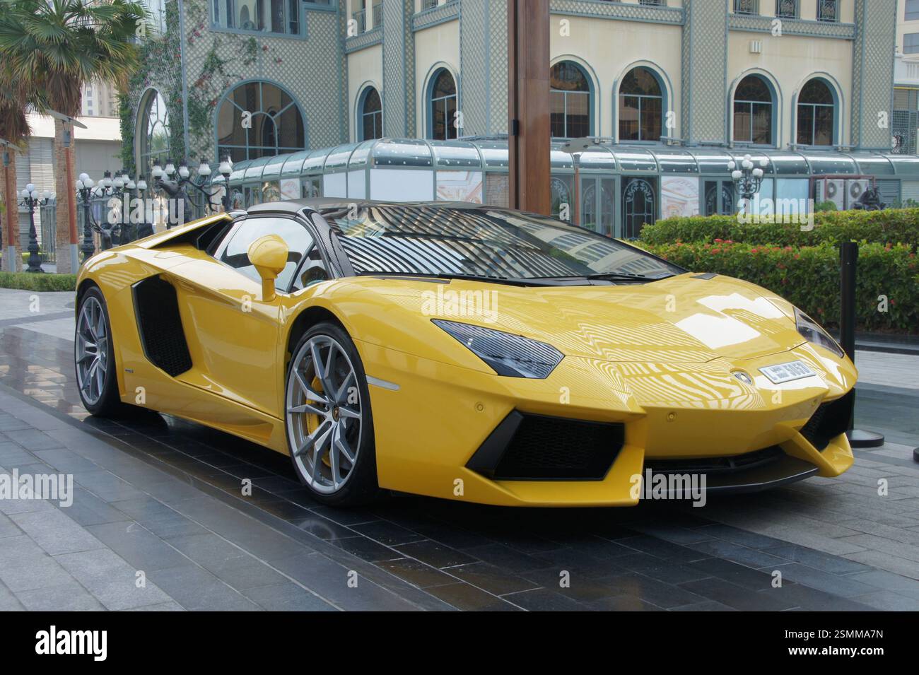 Dubai's sleek skyscrapers form a backdrop for a gleaming yellow ...