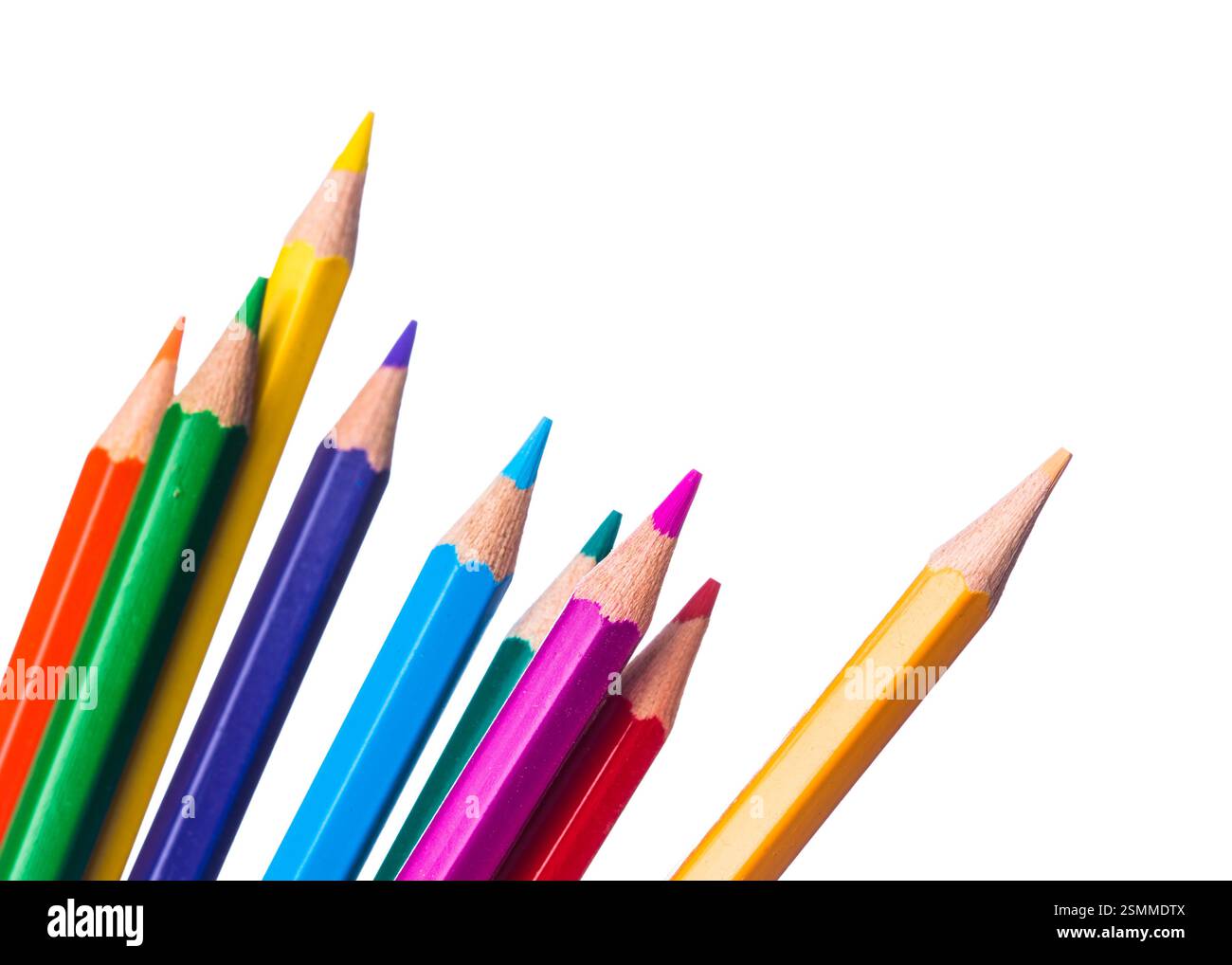 Brightly colored pencils arranged in a row on a white background ...