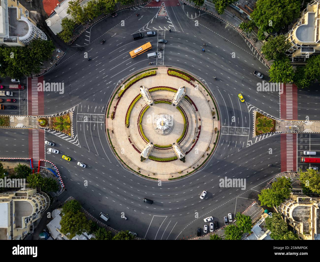 Aerial view of Democracy monument, a roundabout, with cars on busy ...