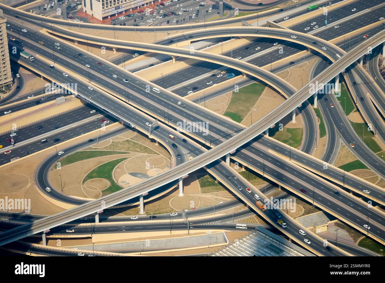 Dubai's intricate highway interchange, a web of lanes teeming with ...