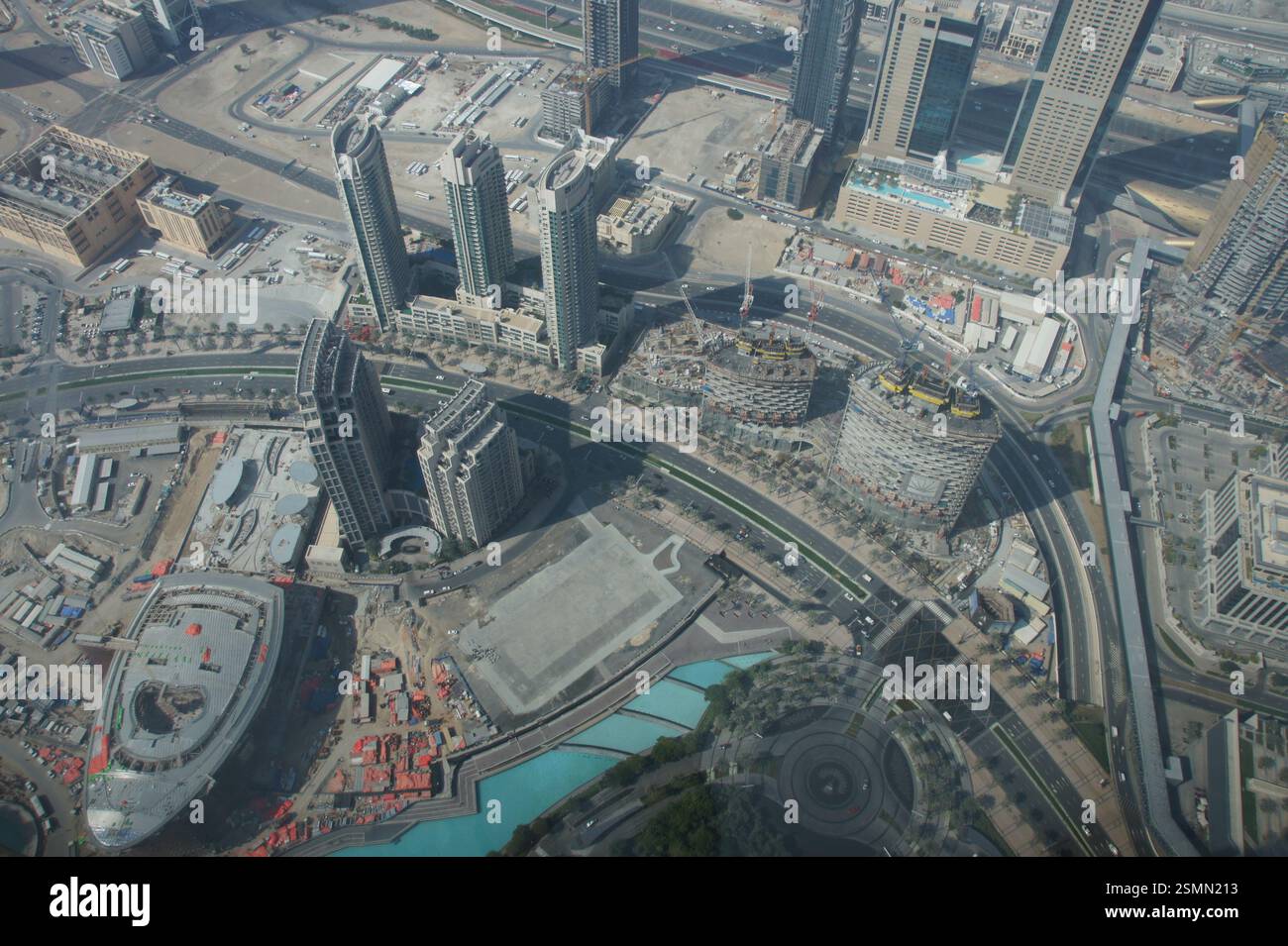 Busy metropolis, Dubai. A bird's-eye view reveals a sprawling city with ...