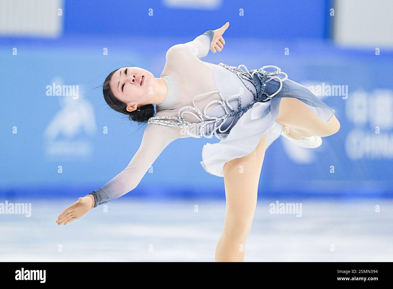 Harbin,China.12th February 2025. An Xiangyi of China competes in the ...