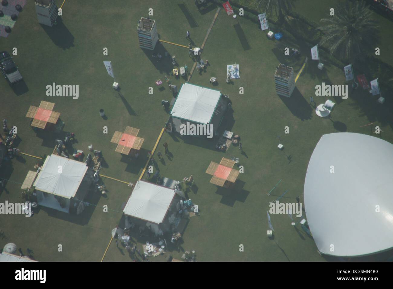 A sea of colorful tents stretches across the vast Dubai landscape. From ...