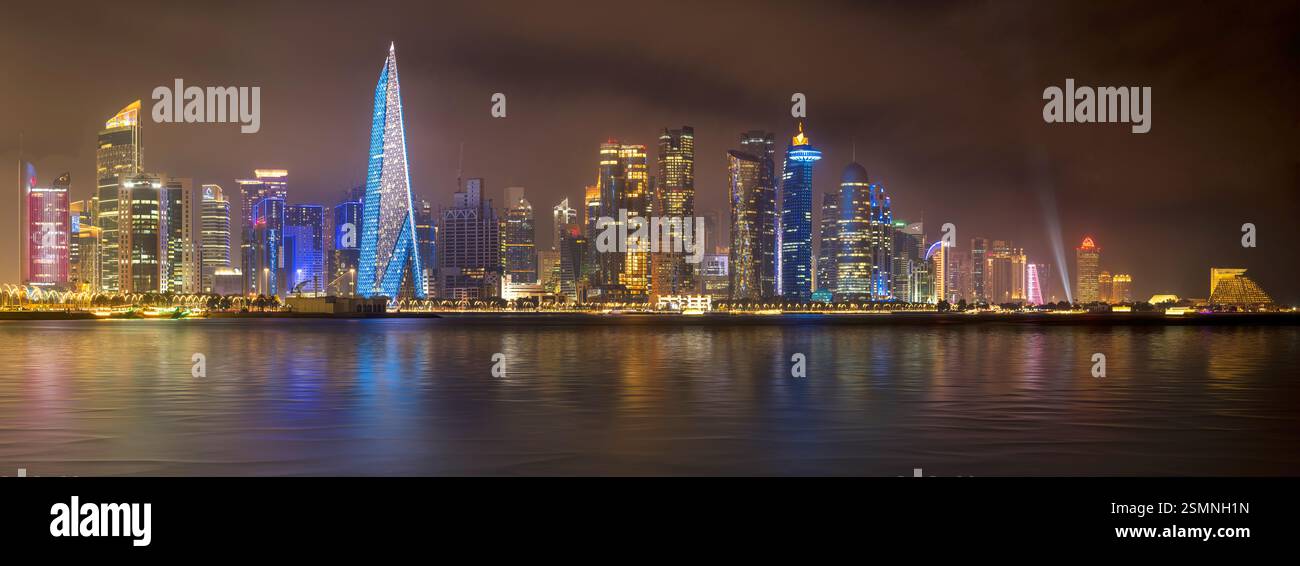 Doha, Qatar - February 12, 2025: Panoramic Doha Skyline night view ...