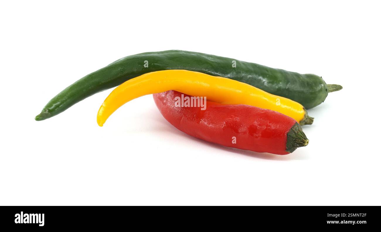 Chili peppers of different colors isolated on white background, showing ...
