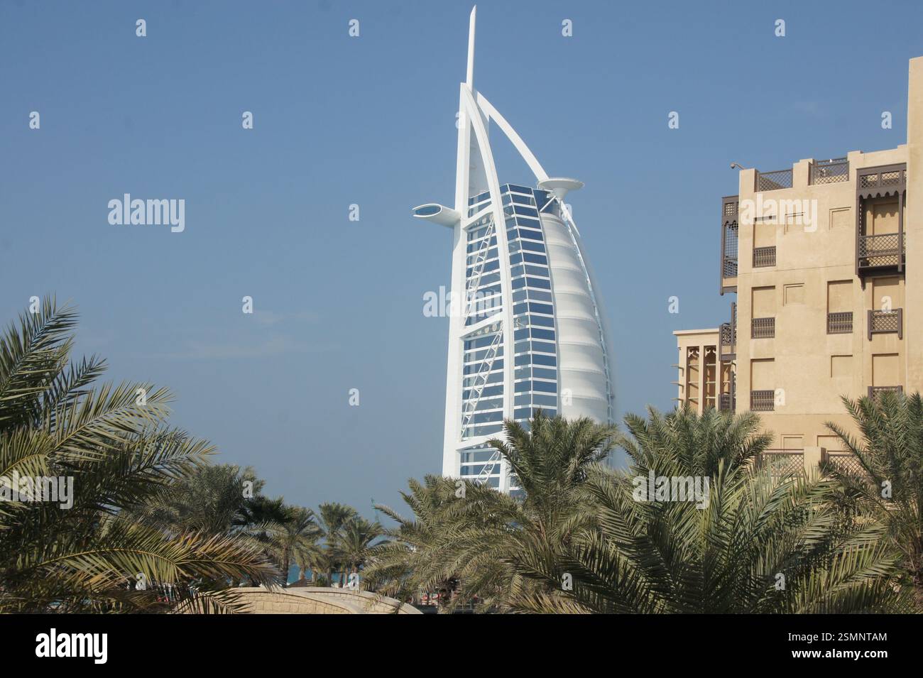 Dubai's Jumeirah Burj Al Arab, a luxurious hotel resembling a billowing sail, sits on a man-made ...