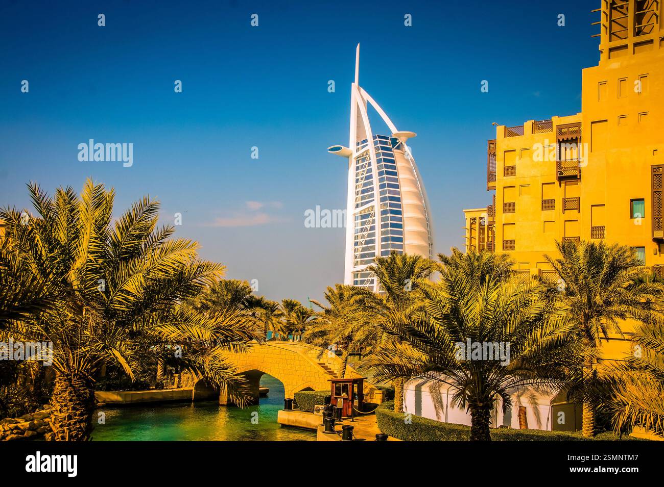 The iconic Burj Al Arab, a sail-shaped luxury hotel, rises from the ...
