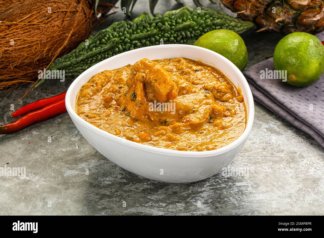 Indian cuisne - Chicken massala with sauce and spices Stock Photo - Alamy