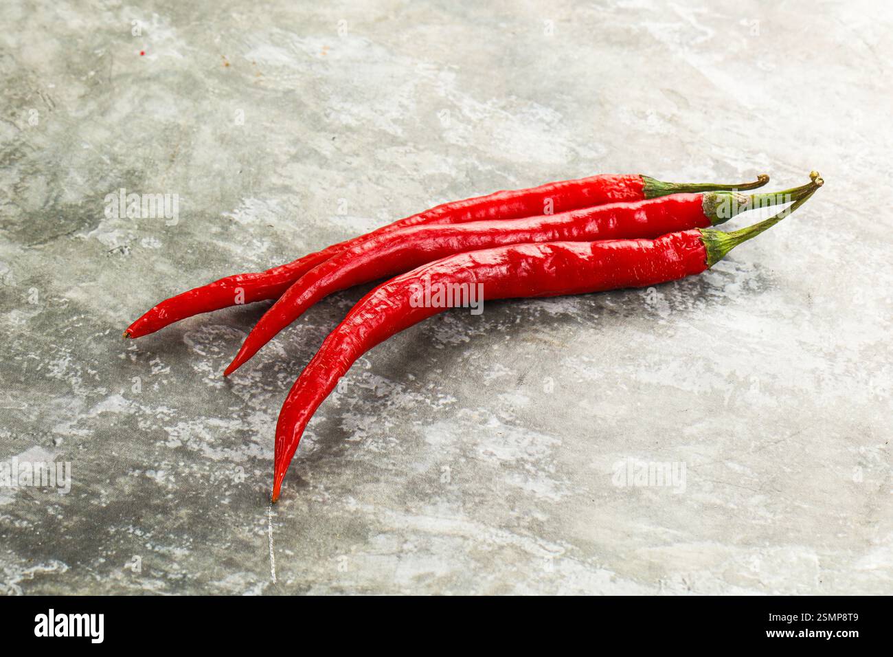 Red hot chilli peppers heap for cooking Stock Photo - Alamy