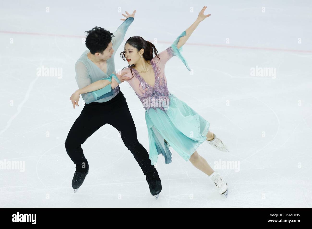 Harbin,China.12th February 2025. Xiao Zixi and He Linghao of China ...