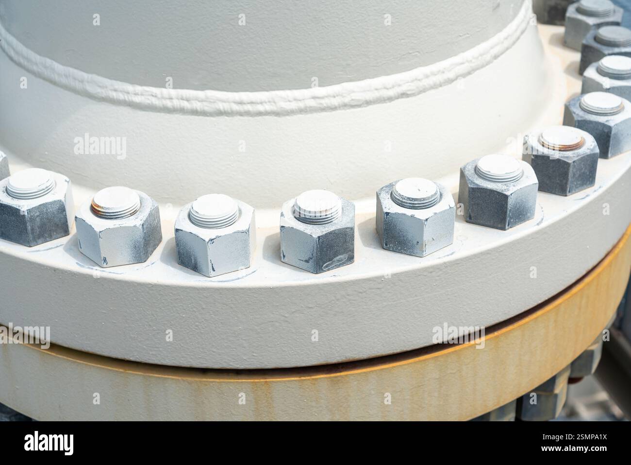 Close-up of an industrial bolted flange showcasing engineering ...