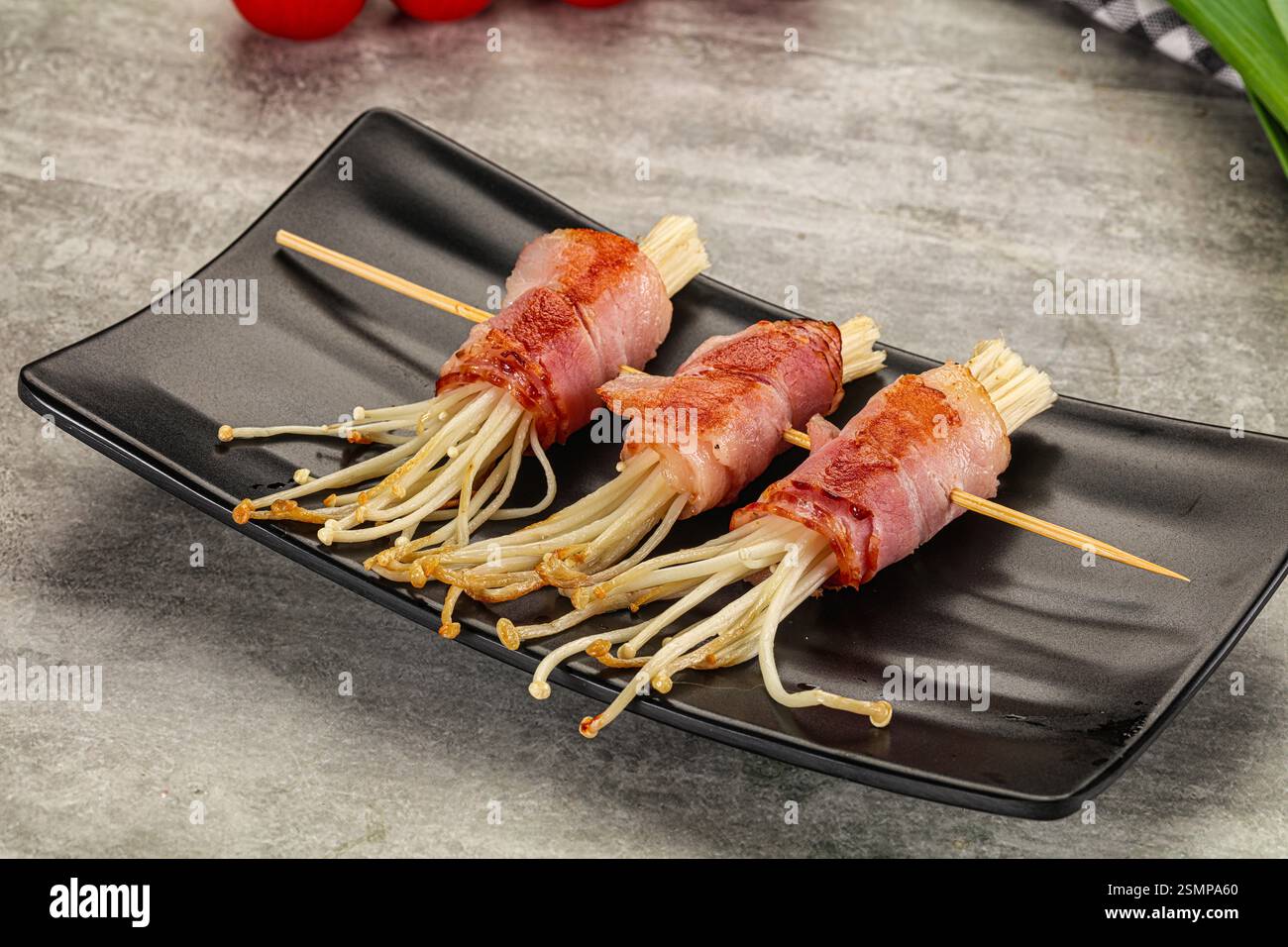 Grilled enoki mushroom with bacon roll wrap Stock Photo - Alamy