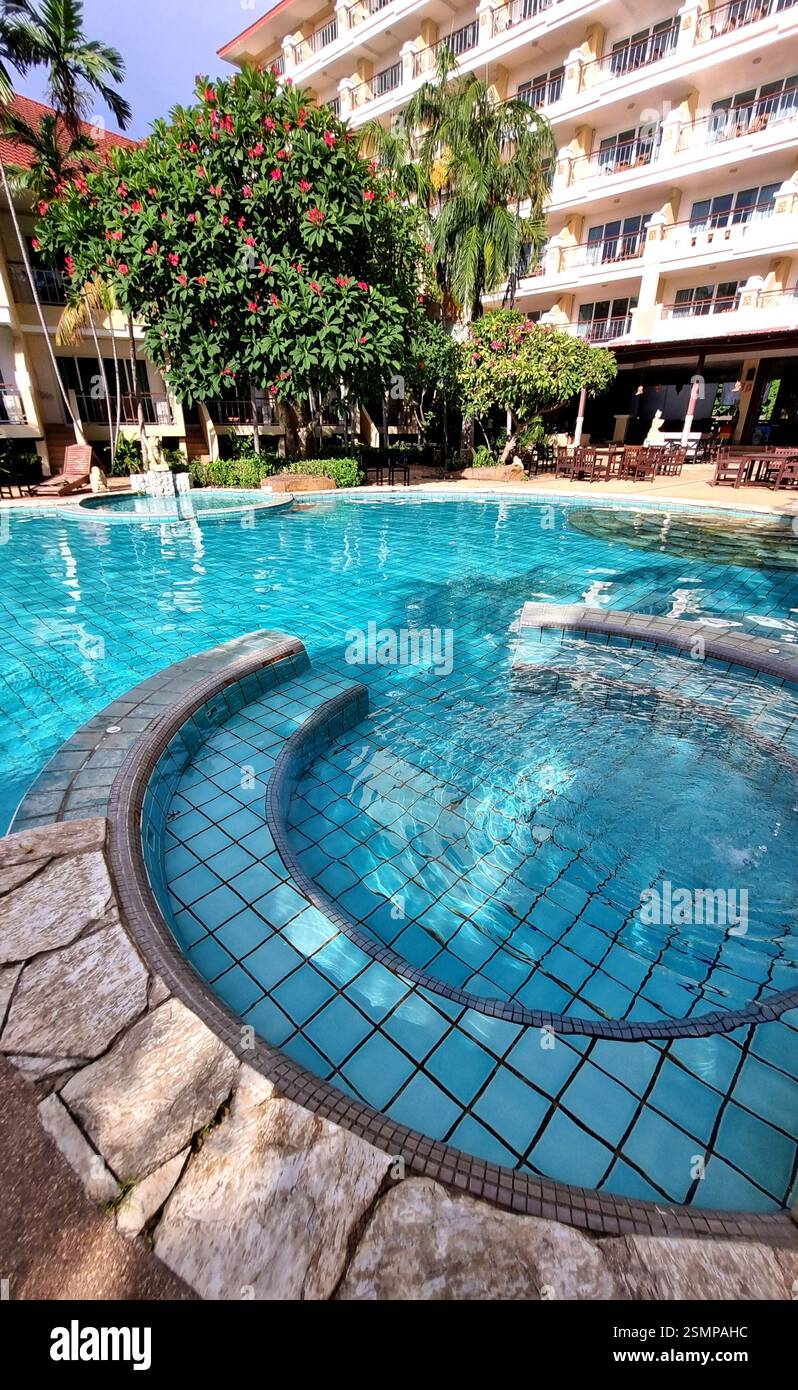 Beautiful and luxurious swimming pool in resort Stock Photo - Alamy