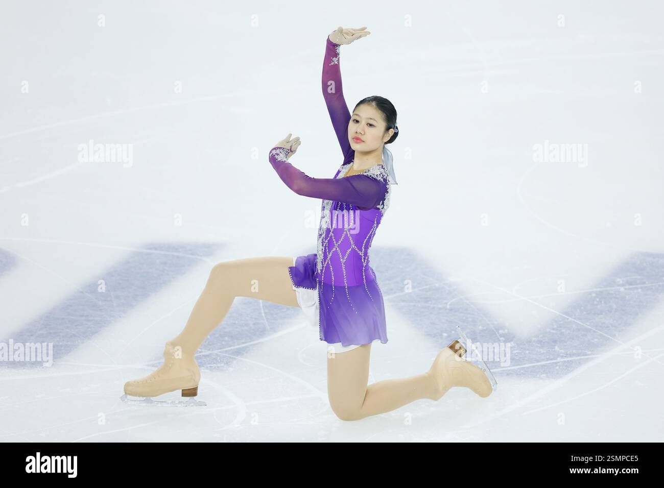 Harbin,China.12th February 2025. Afrina Diyanah of Malaysia competes in ...