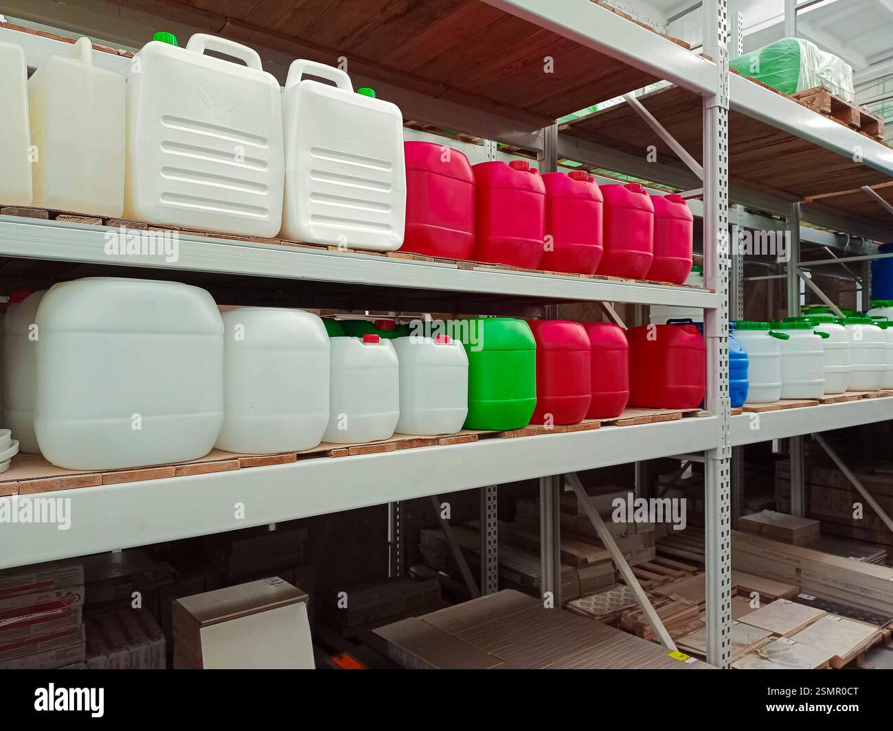 Various colored plastic storage containers neatly arranged on ...