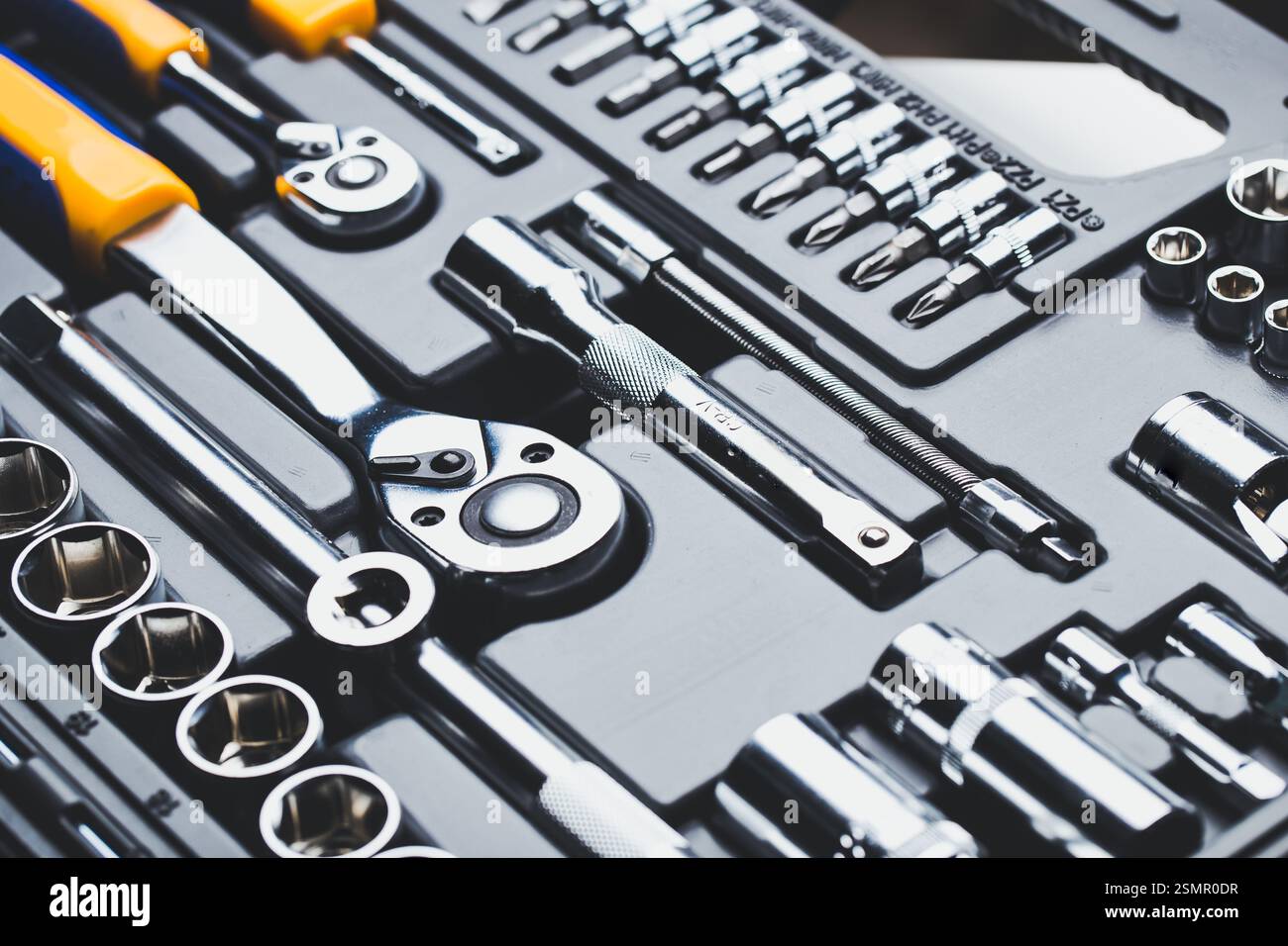 Comprehensive tool set arranged neatly on a flat surface displaying ...