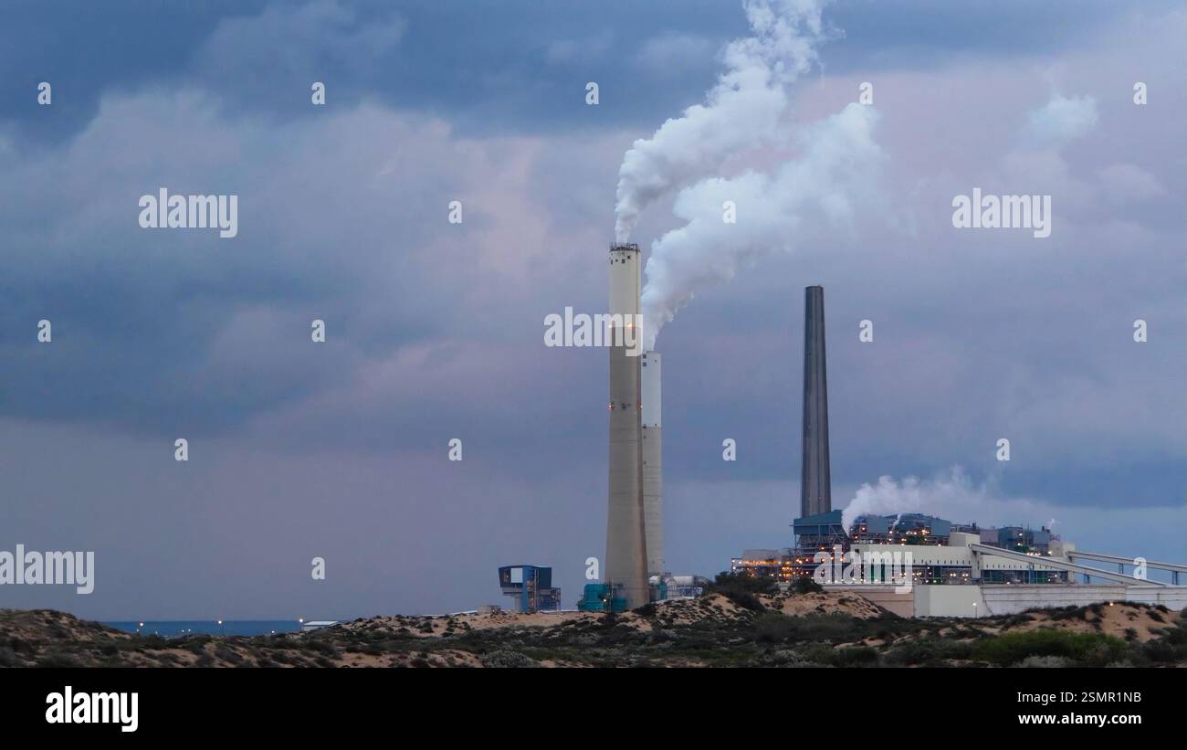 Smoke plume from chimney of the coal-fired power plant named Rutenberg ...