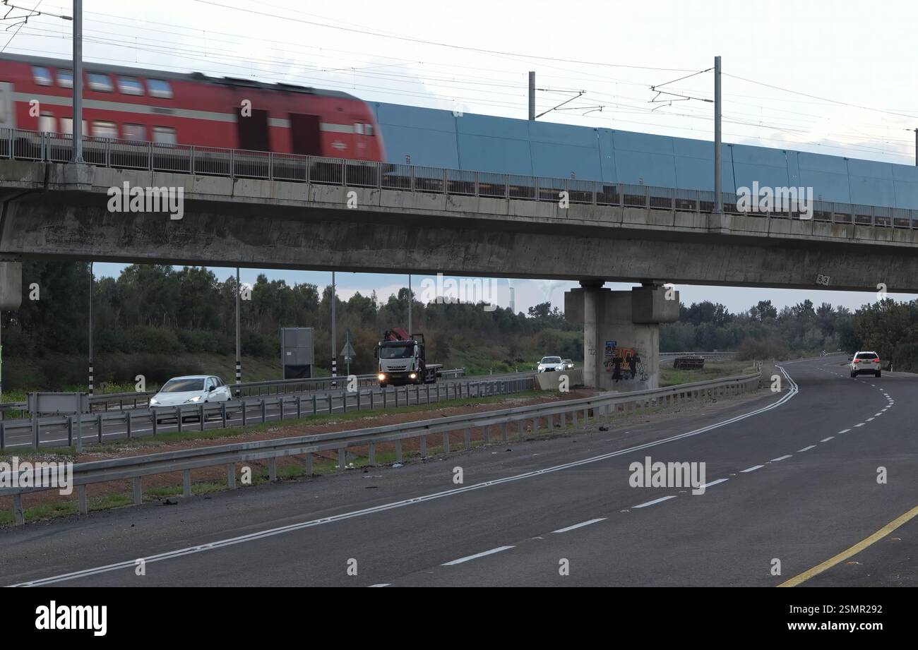 The Ashkelon-Sderot train passes by a defensive wall built by the IDF ...