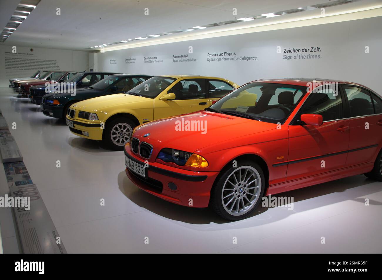 A row of classic BMW cars on display at the BMW Museum in Munich ...